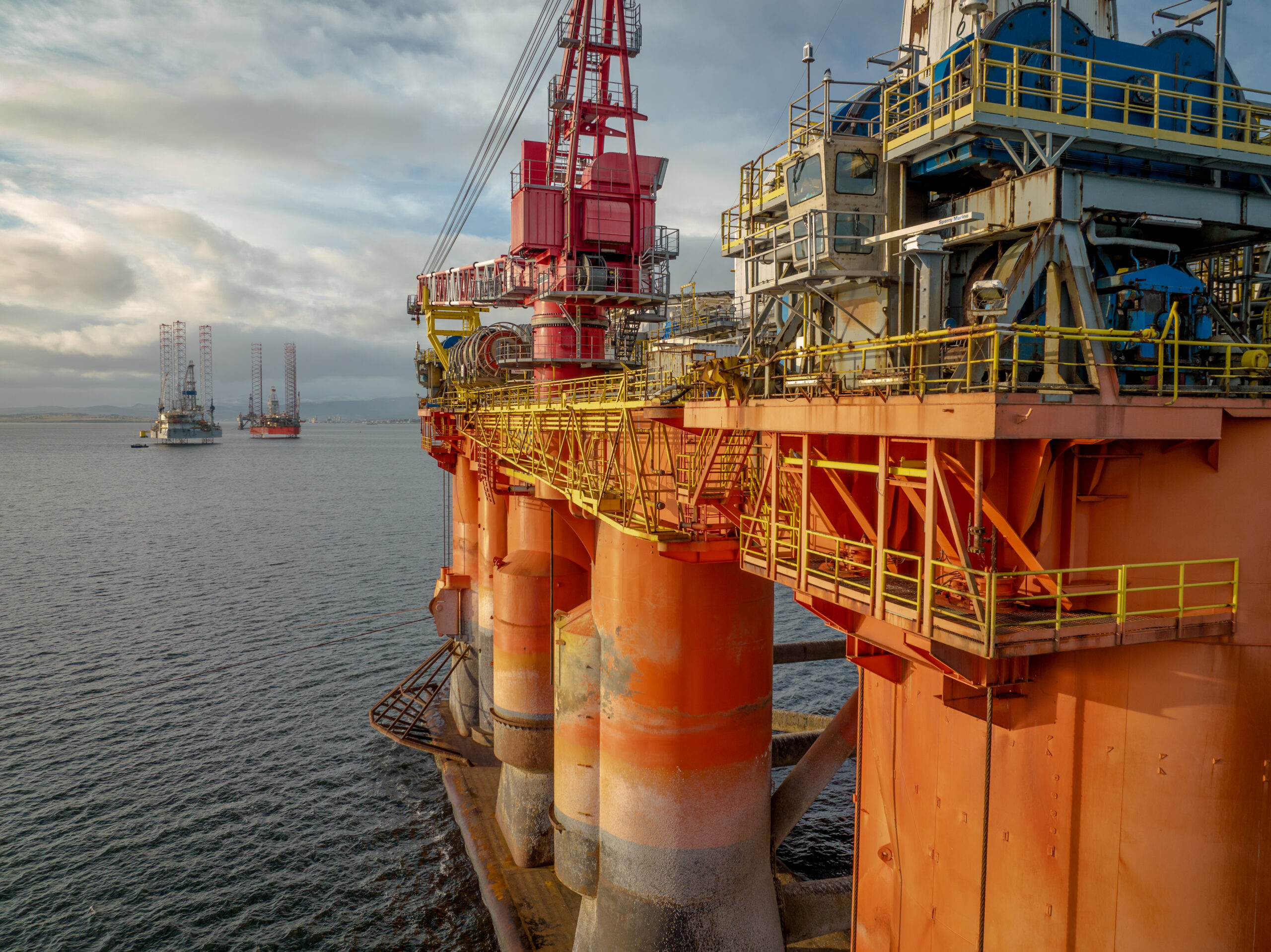 sunset-view-of-an-oil-and-gas-rig-and-platform-at-2024-12-06-18-50-37-utc-scaled.jpg